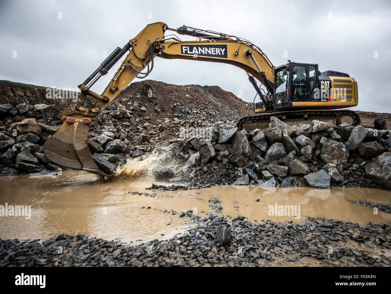 Diggers working in quarry during Borders Railway construction Stock ...