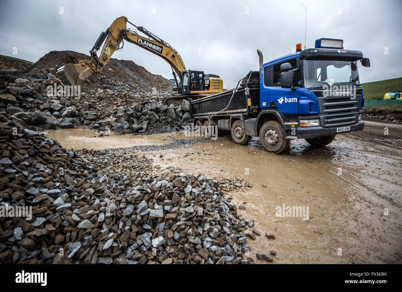 Diggers working in quarry during Borders Railway construction Stock ...