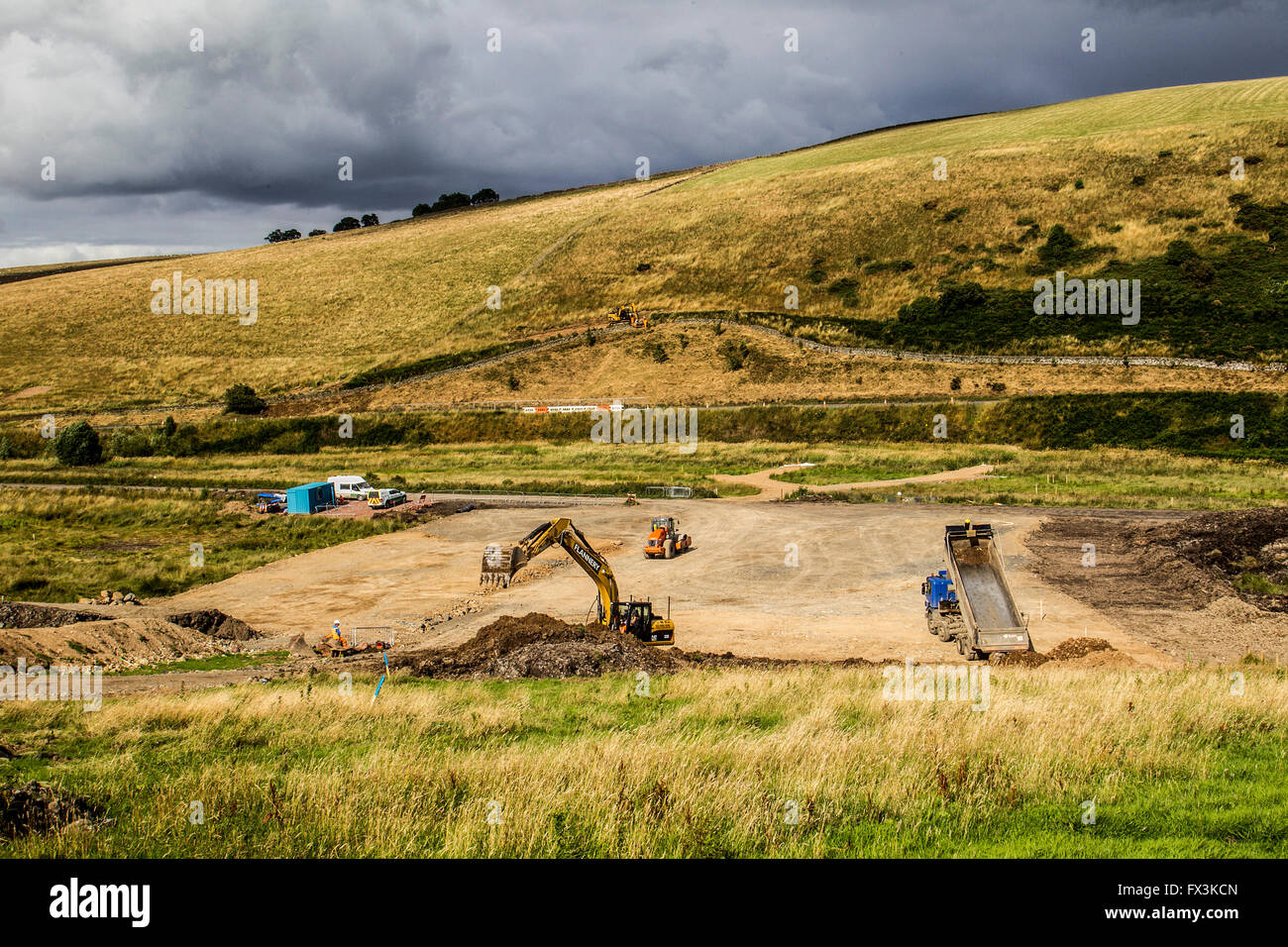 Diggers in use during construction of the Borders Railway , Scotland ...