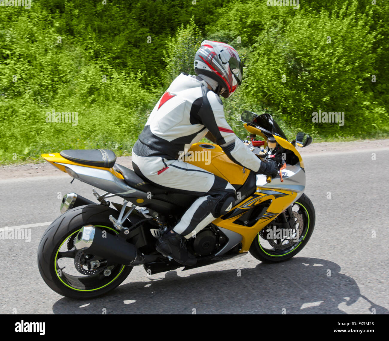 motorcyclist biker fast riding Stock Photo - Alamy