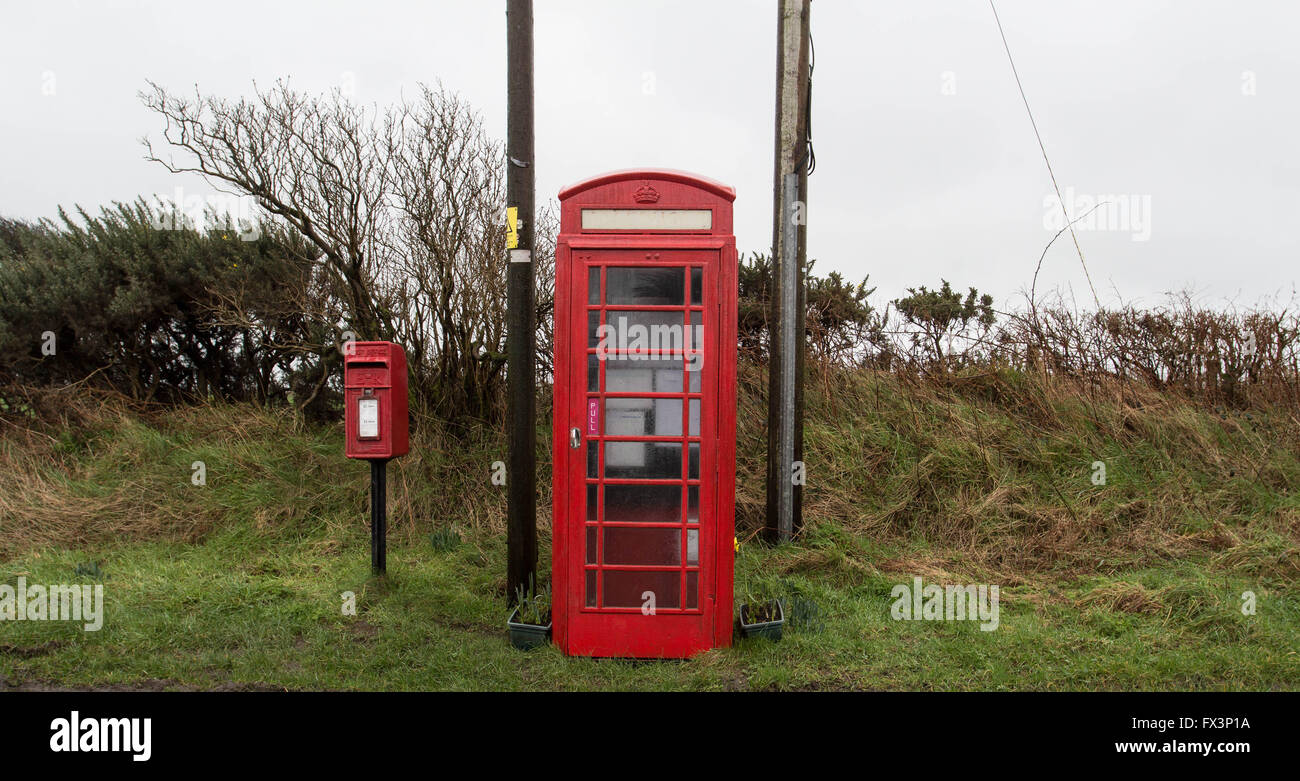 A red telephone box and postal box n the countryside Stock Photo - Alamy