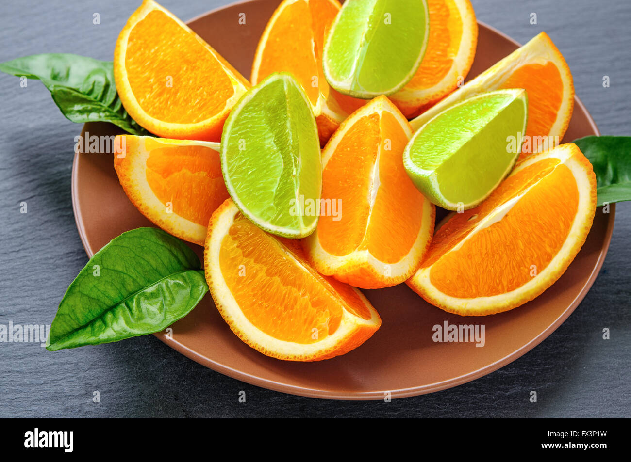 Lime segments cut half hi-res stock photography and images - Alamy