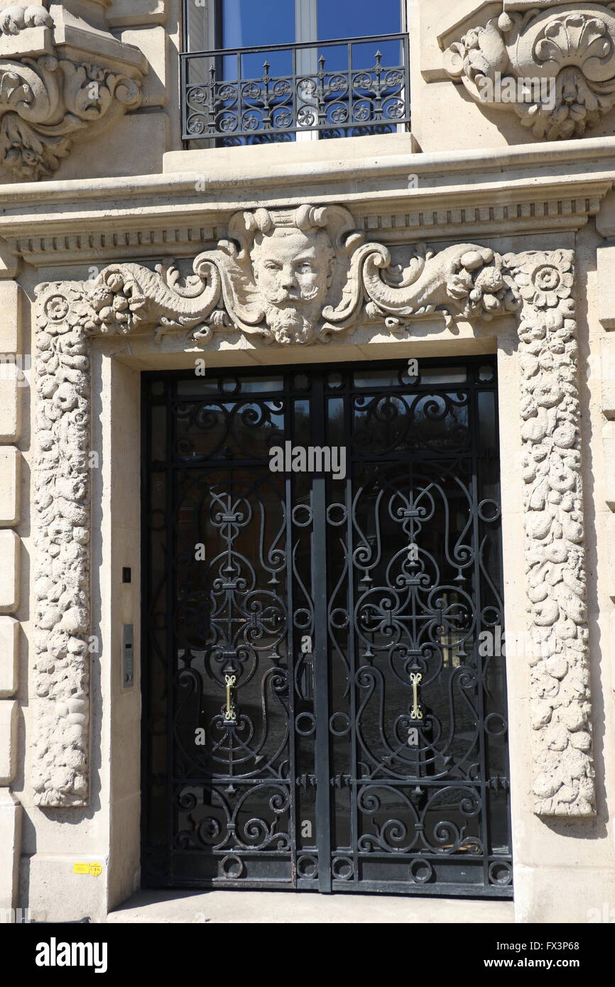 Classical and old door in Paris Stock Photo - Alamy