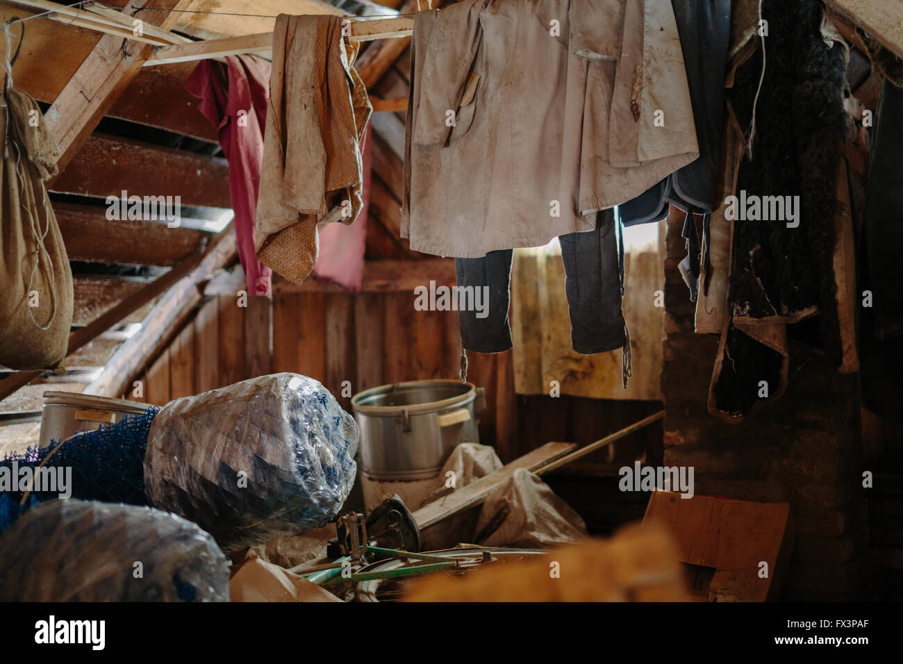 Mess in a wooden shed Stock Photo - Alamy