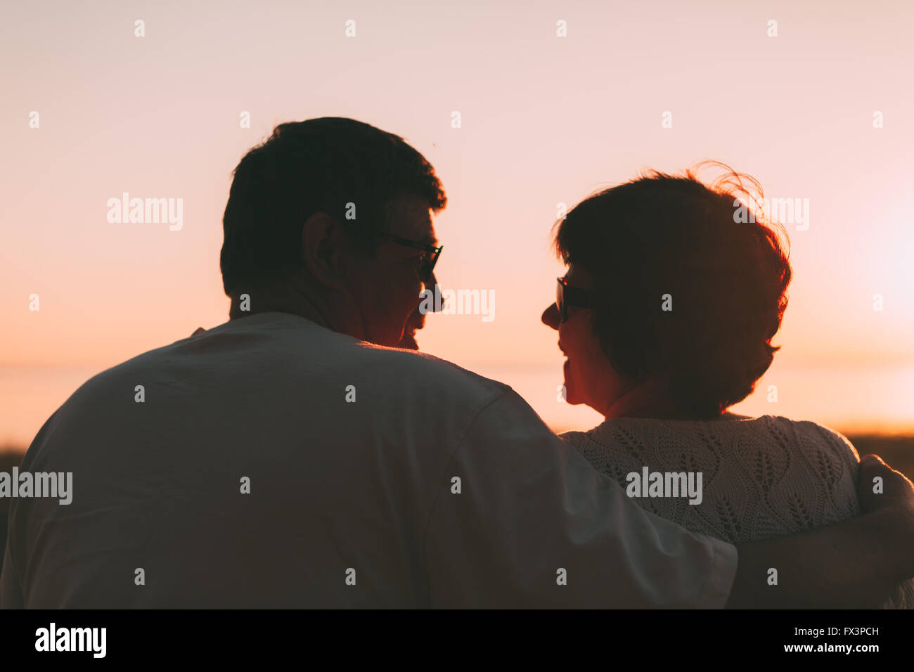 Embracing the sun hi-res stock photography and images - Alamy