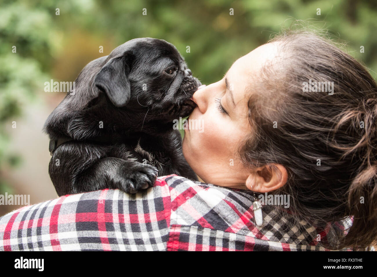 Woman kisses dog hi-res stock photography and images - Alamy