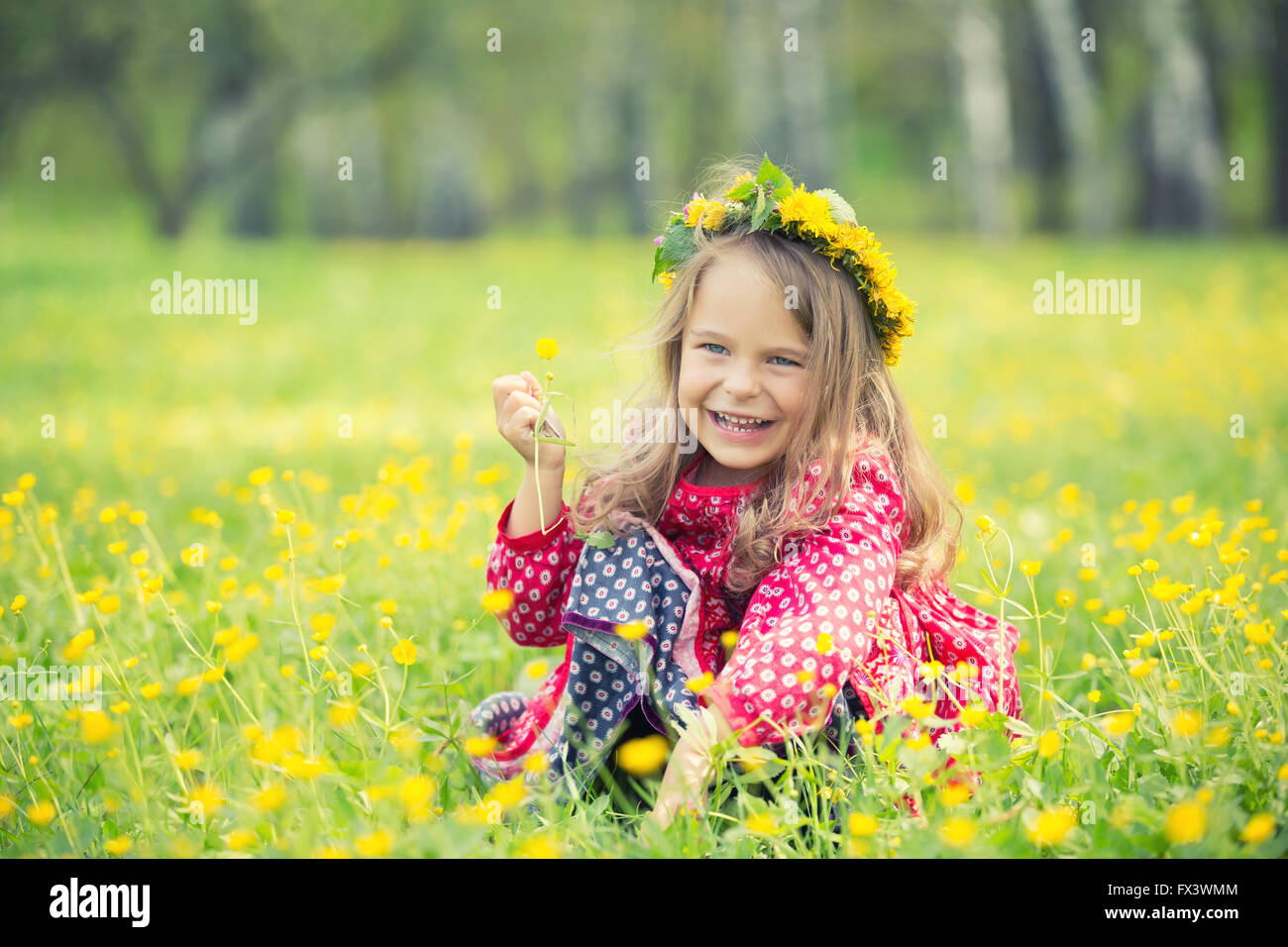 Little girl in spring park Stock Photo - Alamy