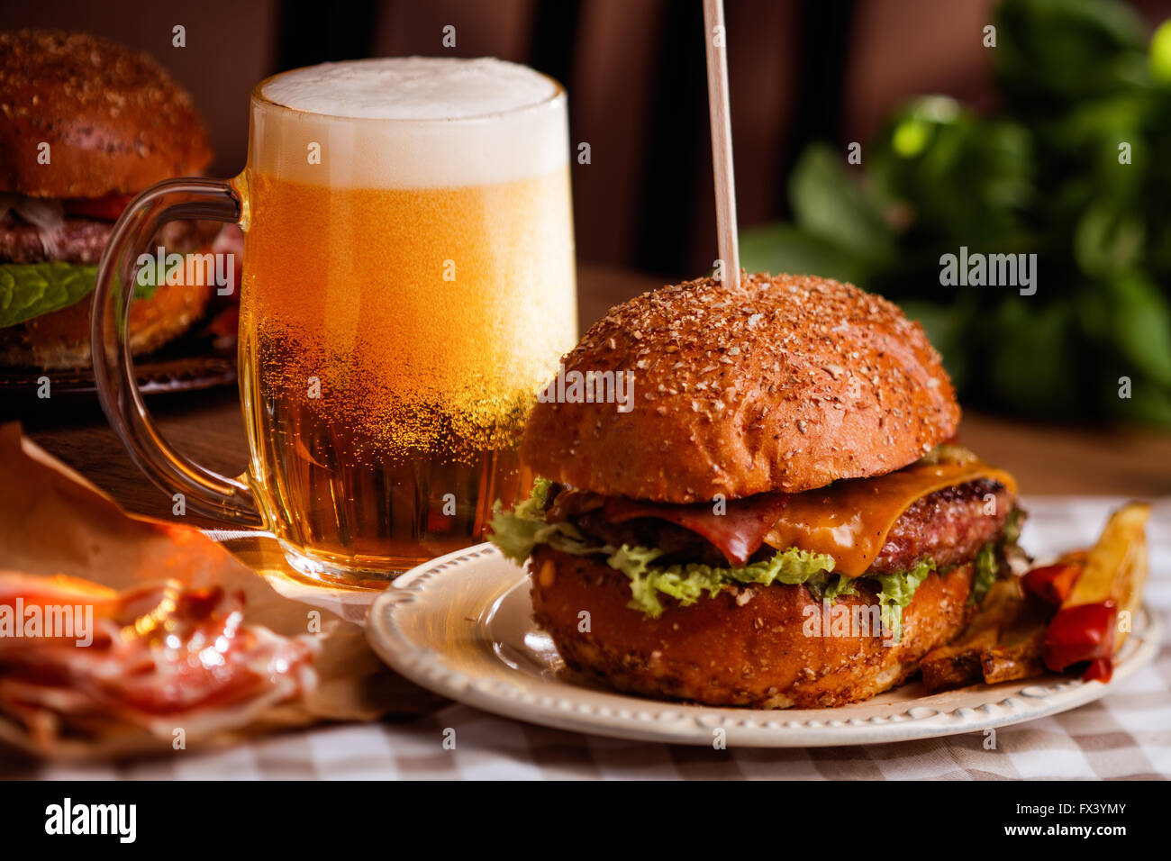 dinner with burger and beer Stock Photo - Alamy