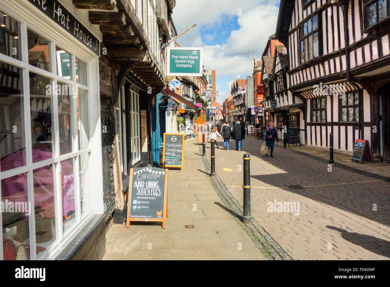 Shops and people shopping in Friar Street in the Shambles in Worcester ...
