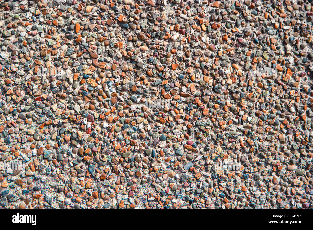 Crushed gravel in cement wall plastered texture Stock Photo - Alamy
