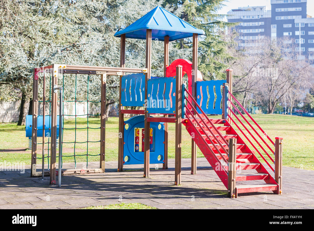 Plastic playground in the park. Children's playground Stock Photo - Alamy