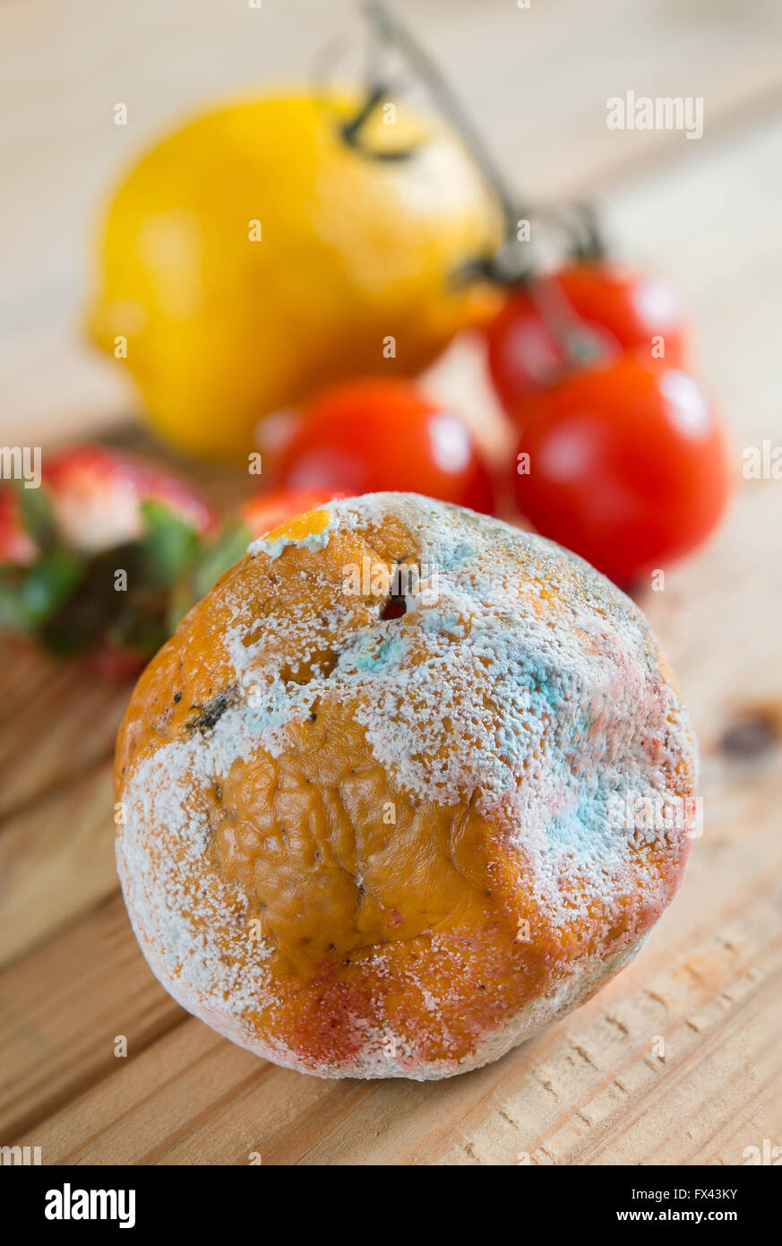 mandarin with mold on the wooden table Stock Photo - Alamy