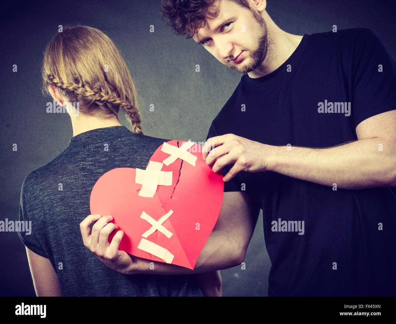 Broken heart difficult love concept. Sad unhappy couple woman and man ...