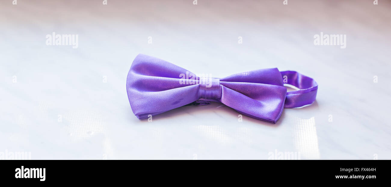 Lilac bow tie hi-res stock photography and images - Alamy
