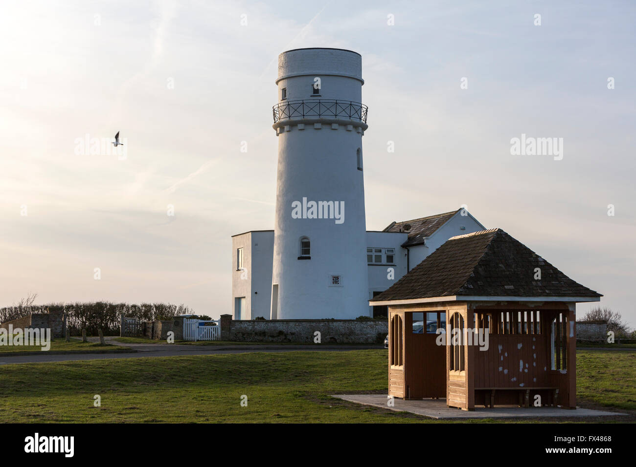 Old Hunstanton Lighthouse now cafe and the Mercy Grey shelter at late ...
