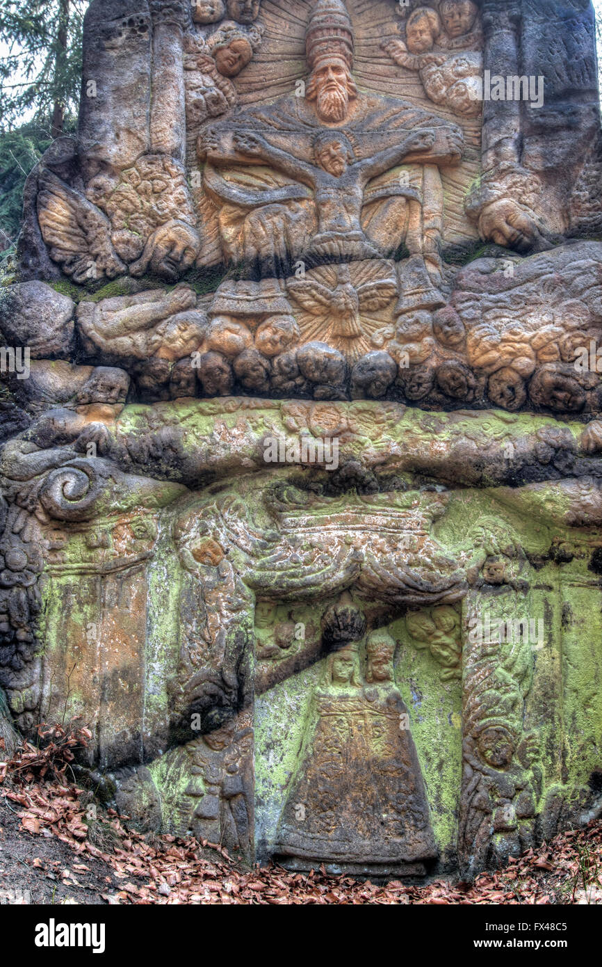Relief of the Holy Trinity - stone altar carved in sandstone cliff in ...