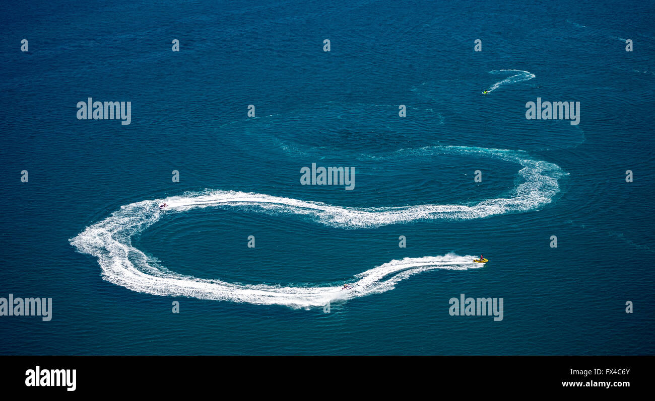 Aerial view, jet moves in a circle, circle drive, green jet skiing ...