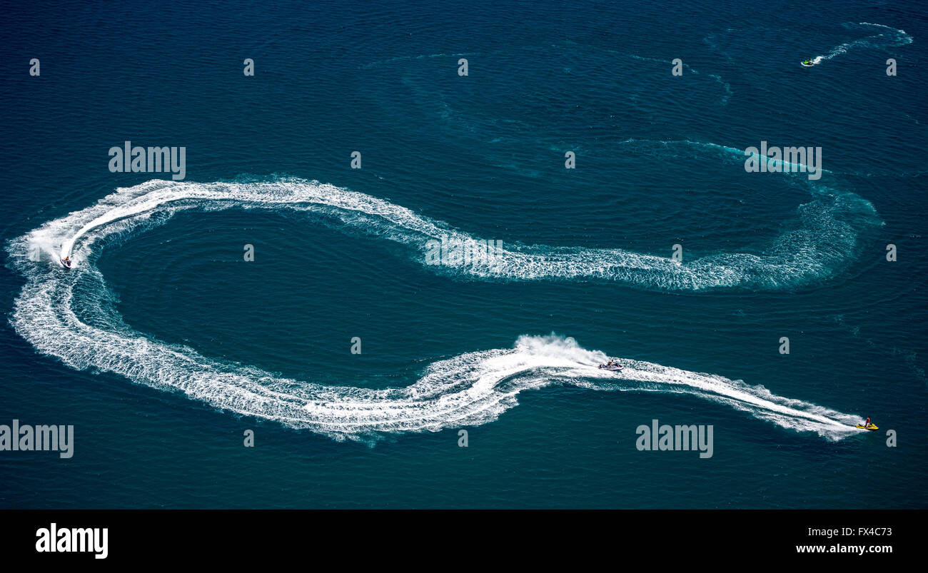 Aerial view, jet moves in a circle, circle drive, green jet skiing ...