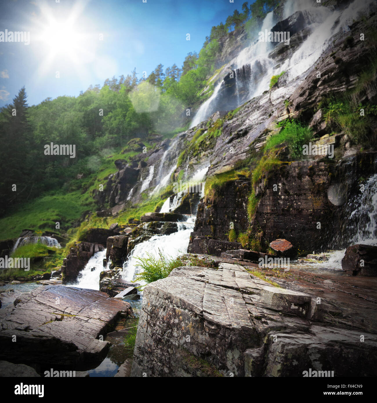 Natural landscape with waterfall Stock Photo - Alamy