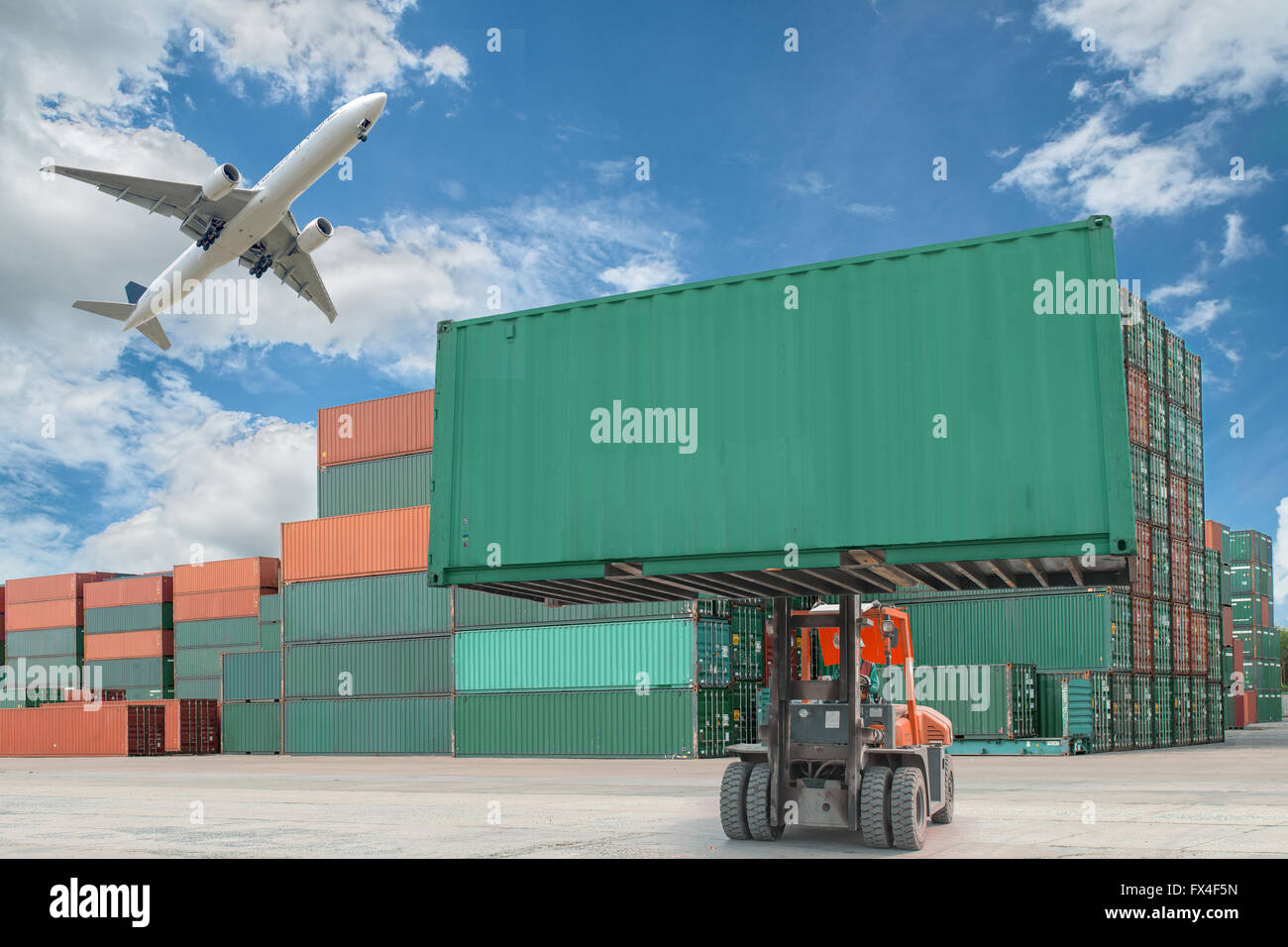 Crane lifter handling container box loading to truck Stock Photo - Alamy