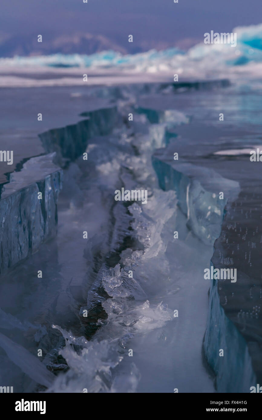 Large cracks on surface of the ice Stock Photo - Alamy