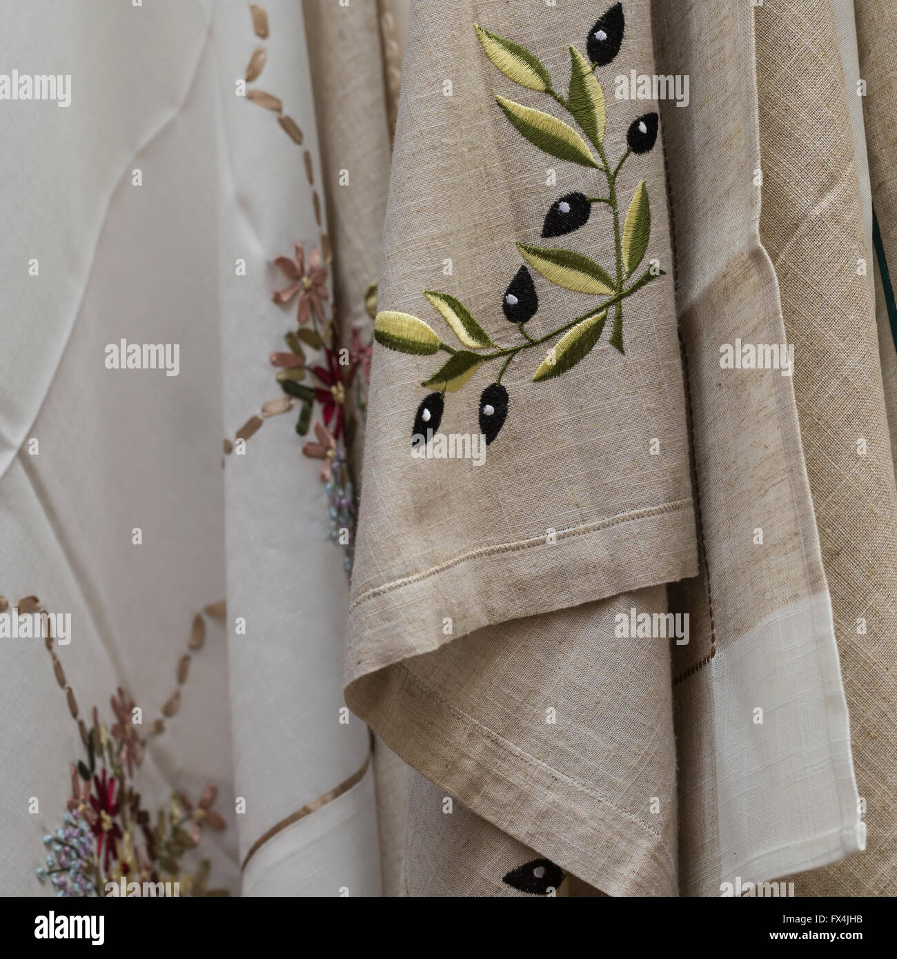 Traditional textiles on a market stall, colorful fabric, handmade ...