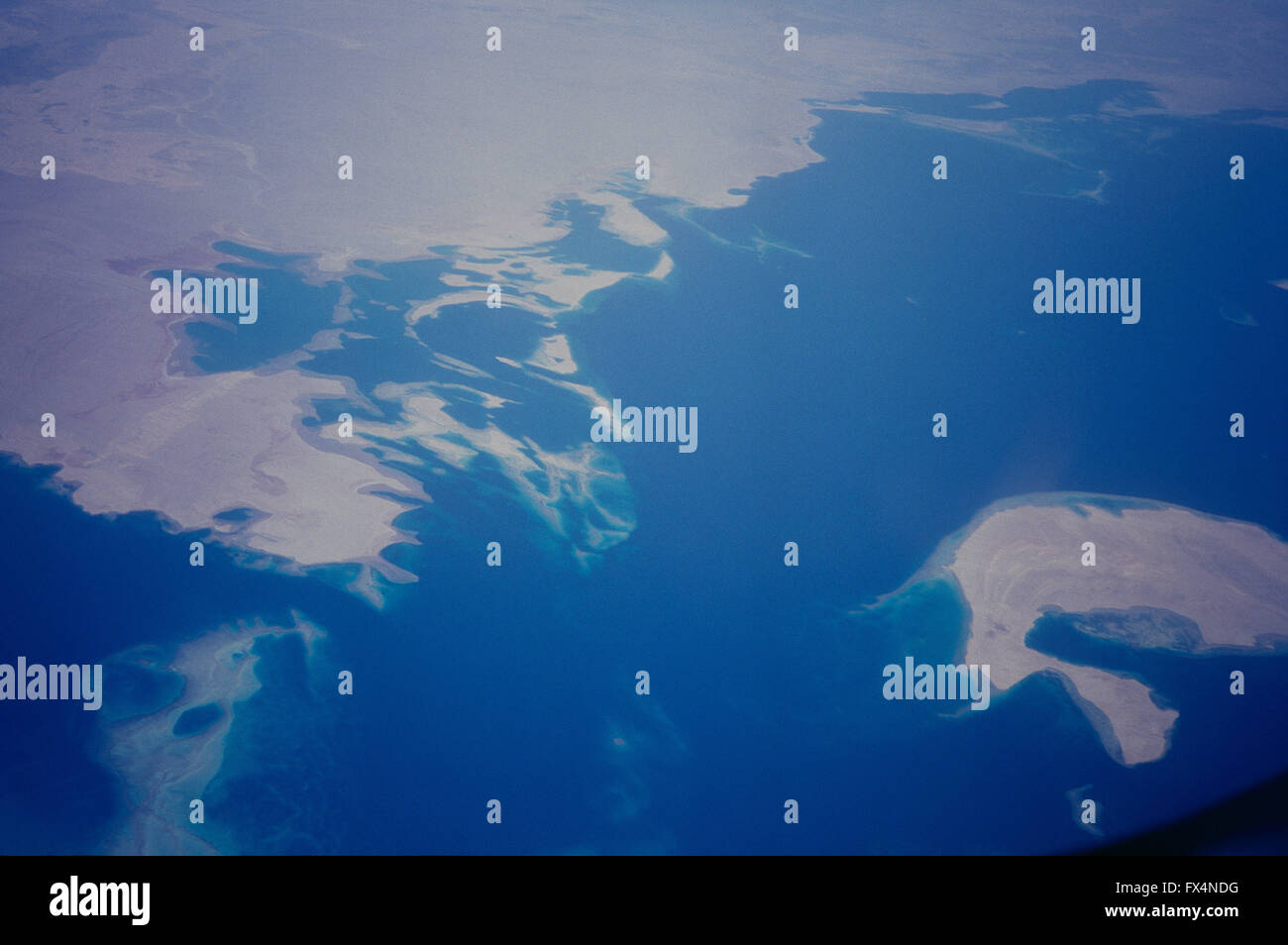 An aerial view of the Strait of Tiran, Red Sea, featuring Sanafir ...