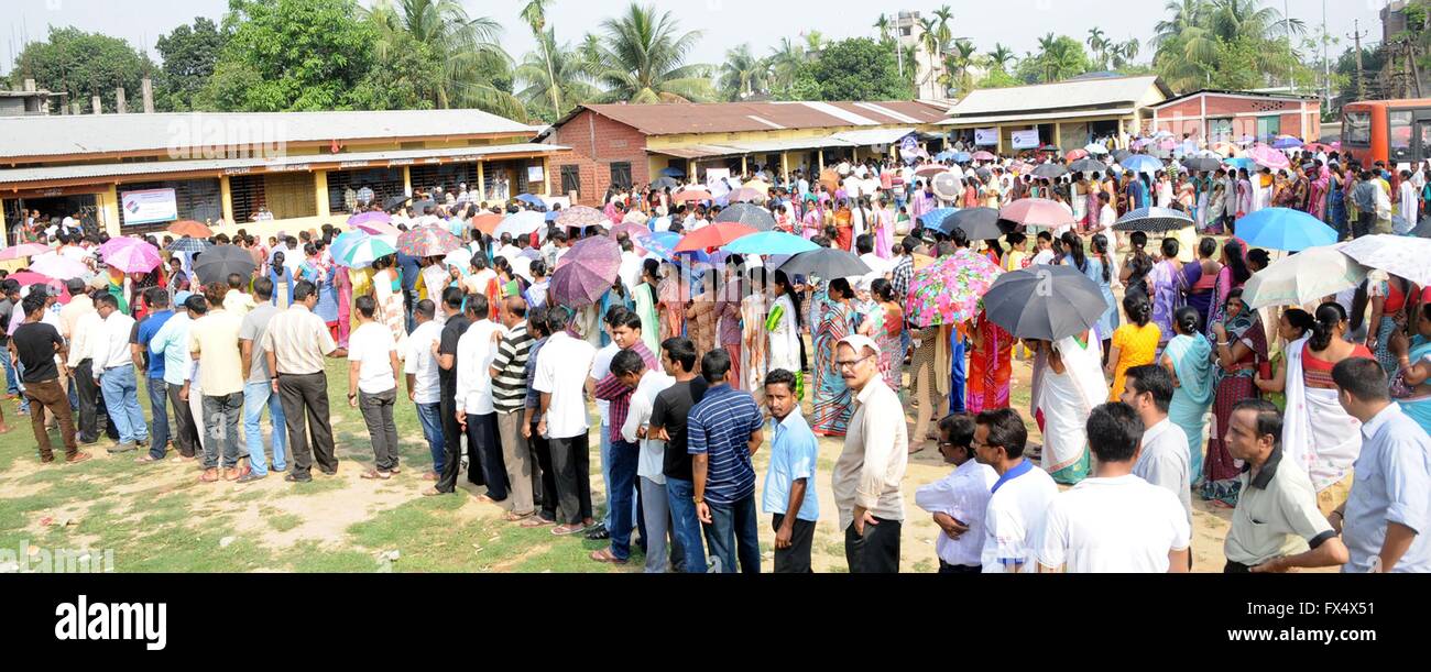 Long lines of voters wait to cast their vote at a remote polling ...