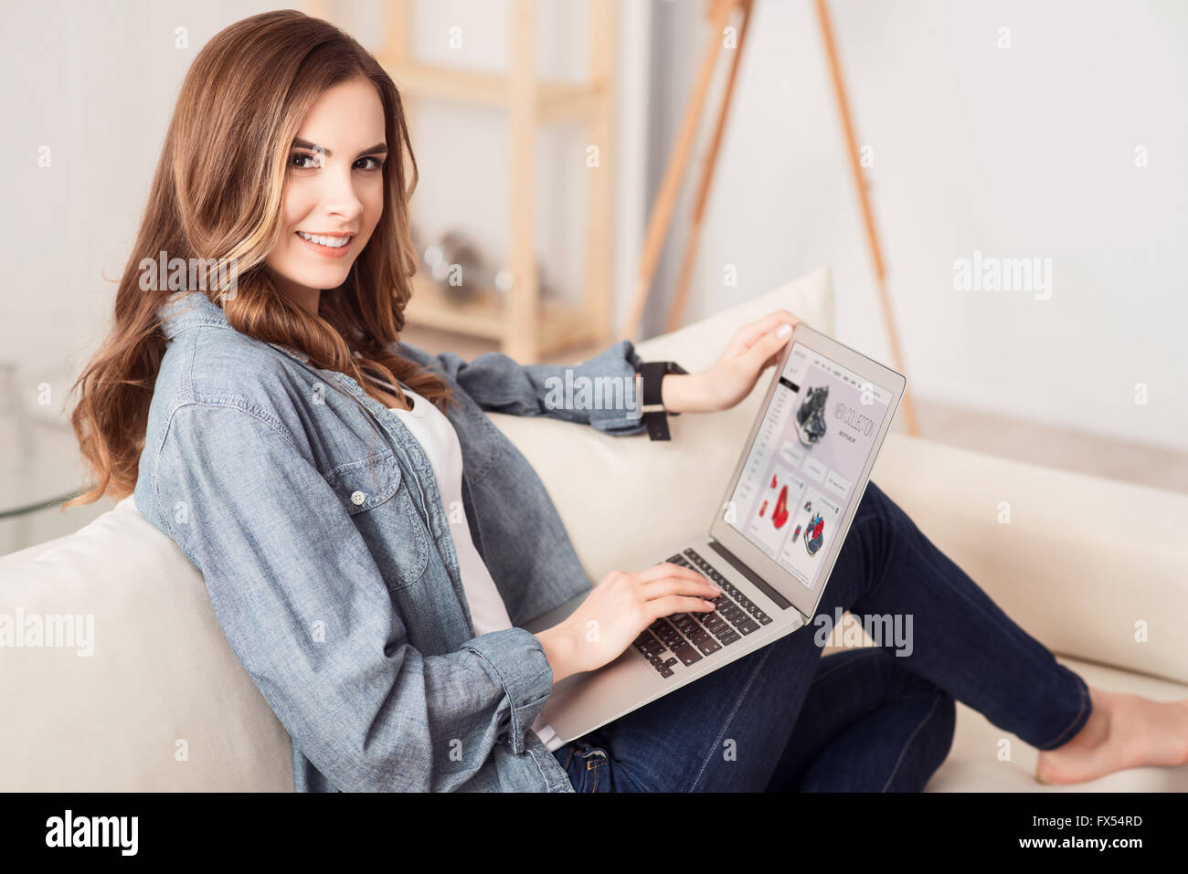 Charming girl working on the laptop Stock Photo - Alamy