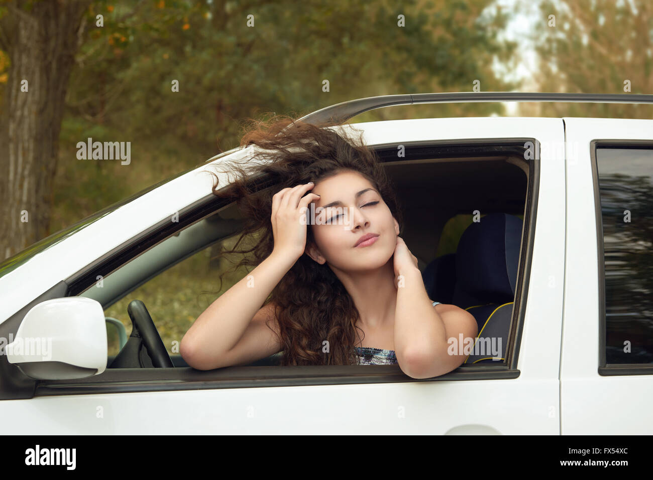 girl driver inside car portrait, eyes closed and dreaming , summer ...