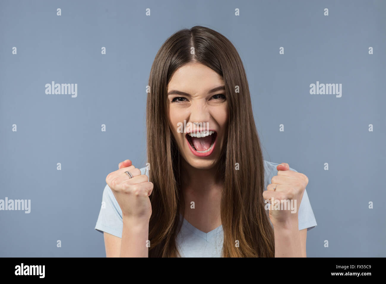 Cheerful girl expressing joy Stock Photo - Alamy