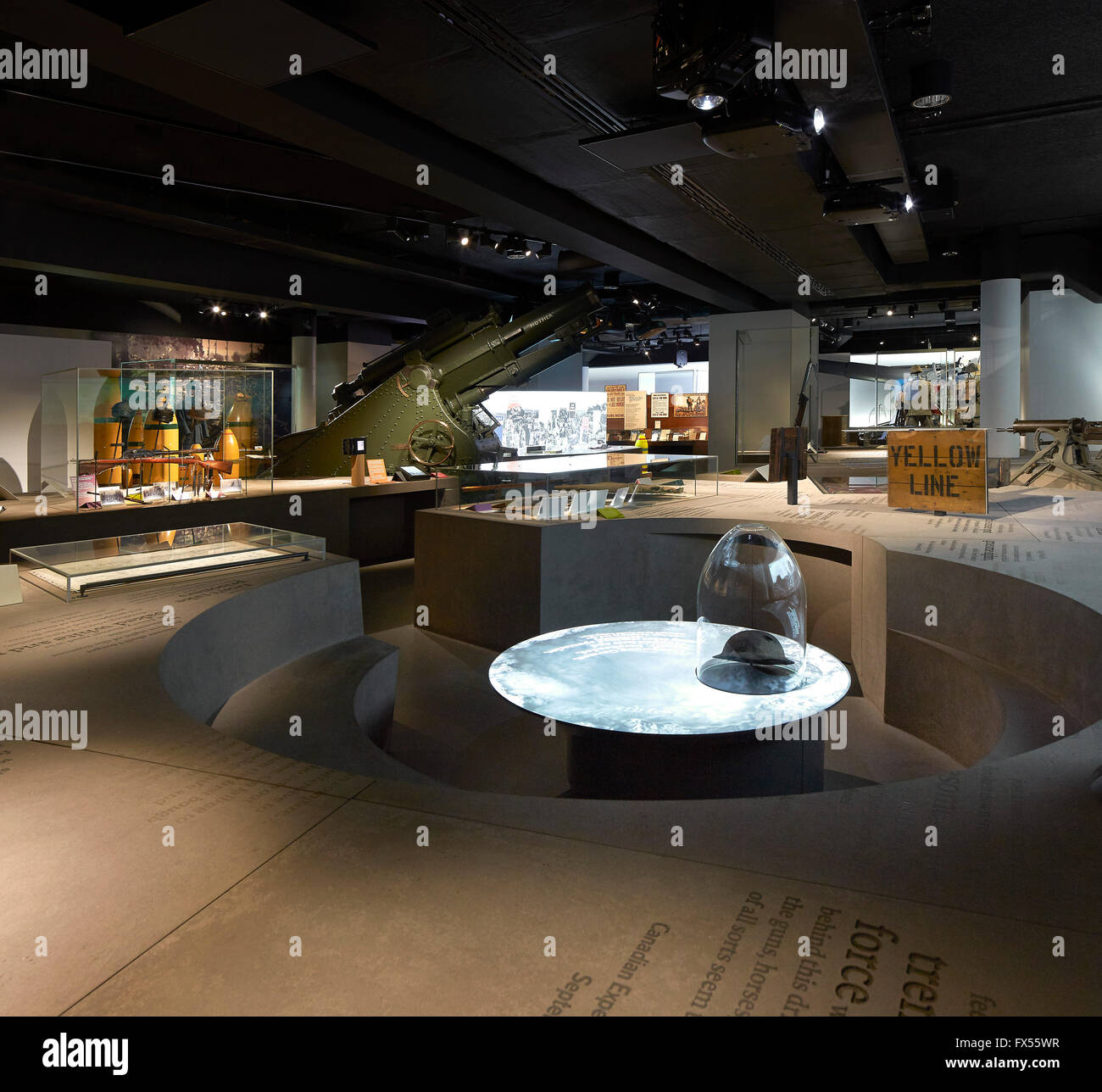 Circular bench within exhibition objects. Imperial War Museum, London ...