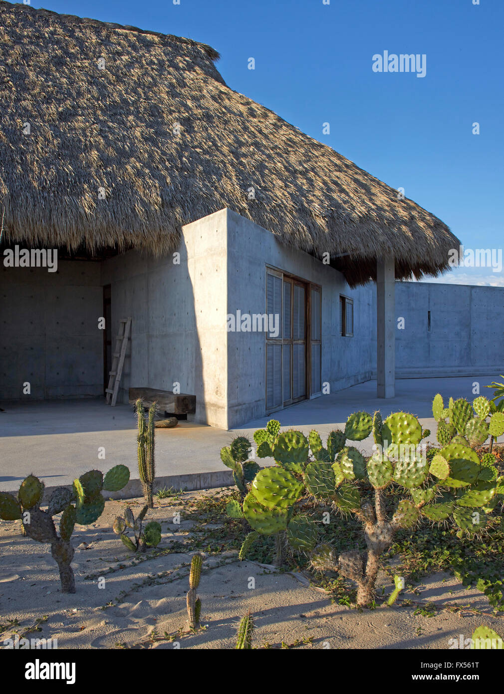 Ocean side view looking into triangular living space within main palapa ...