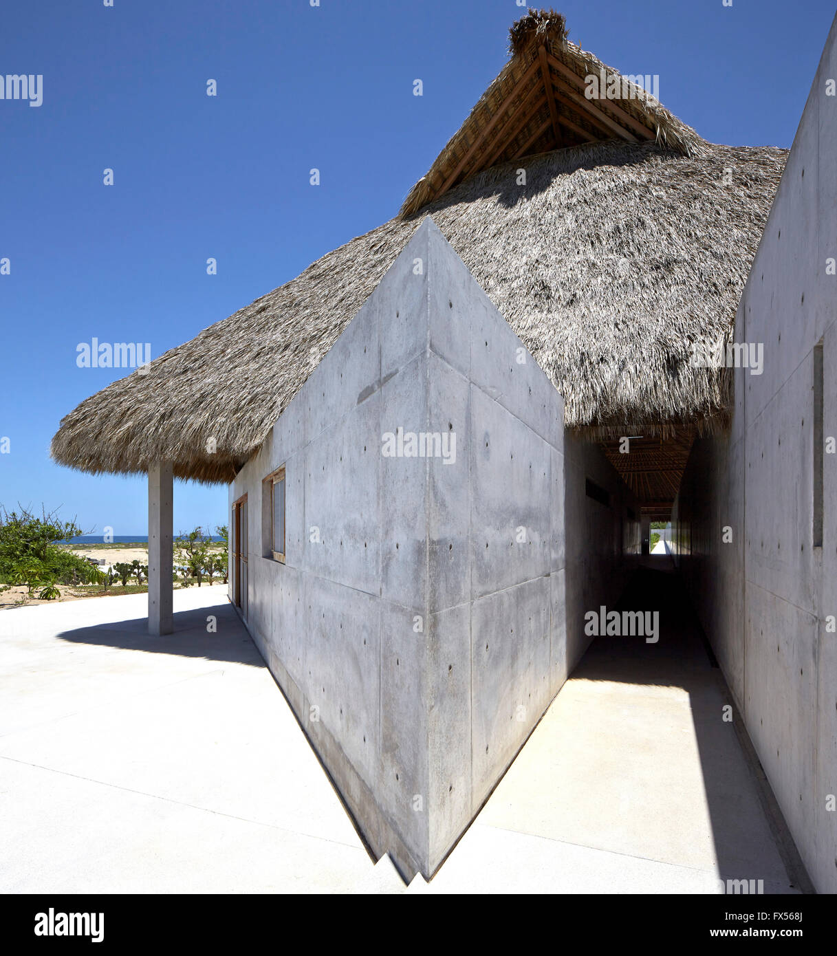 Ocean side view showing triangular living quarters. Casa Wabi, Puerto ...