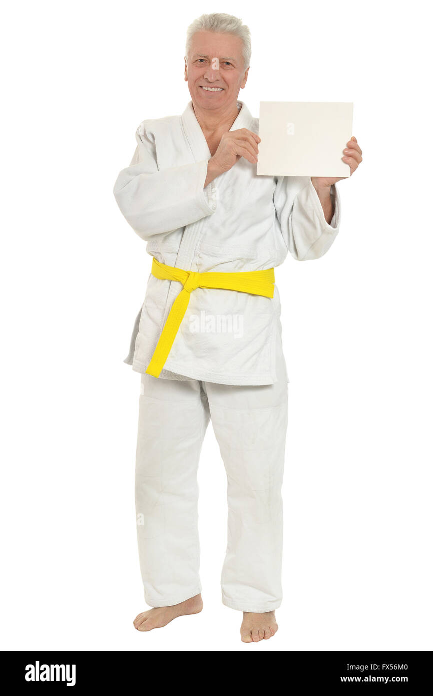 Karate Senior man with poster Stock Photo - Alamy