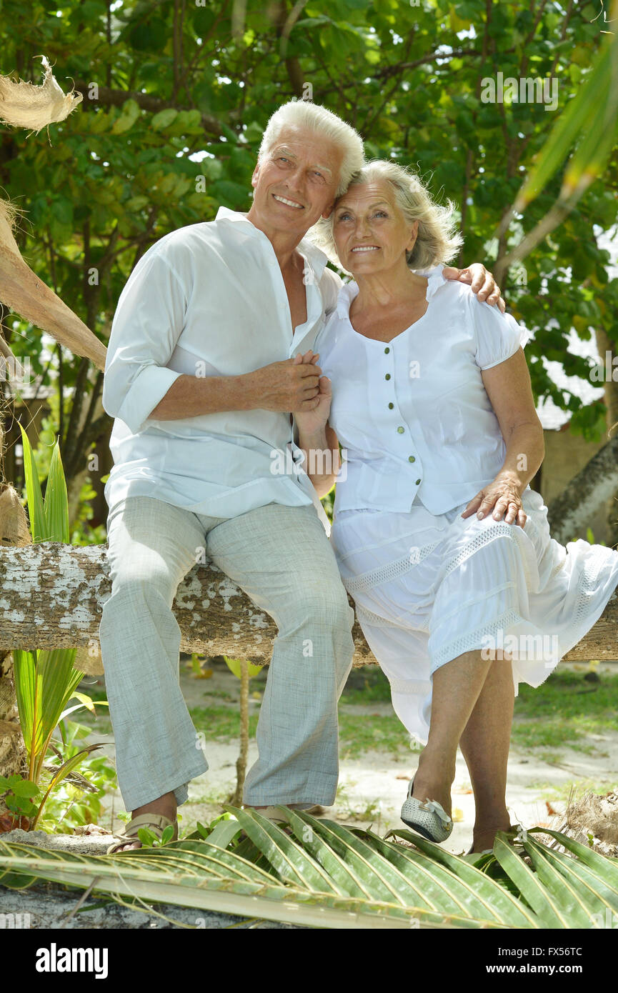 elderly couple rest at tropical resort Stock Photo - Alamy