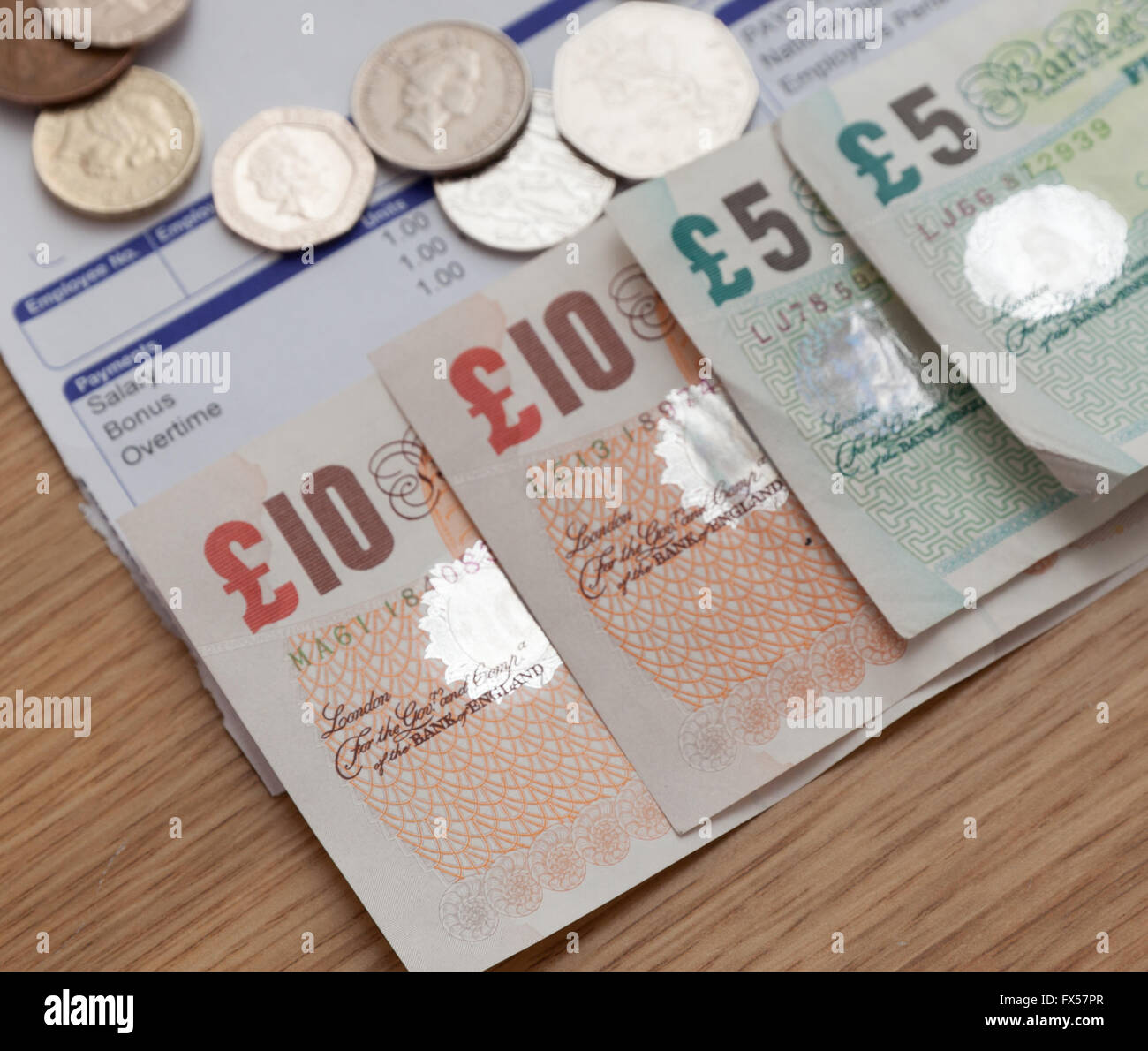 Payslip and money close up shot Stock Photo - Alamy