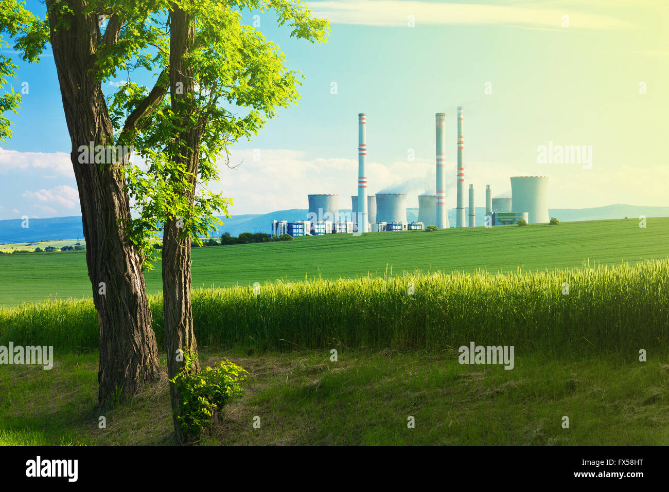 landscape with a tree and power station Stock Photo - Alamy