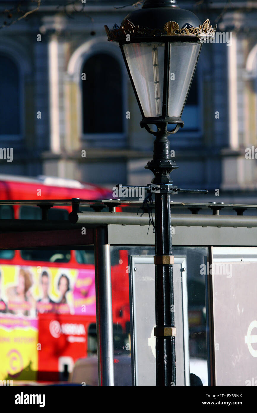 Street light with bus at bus stop in Trafalgar Square, London, England ...
