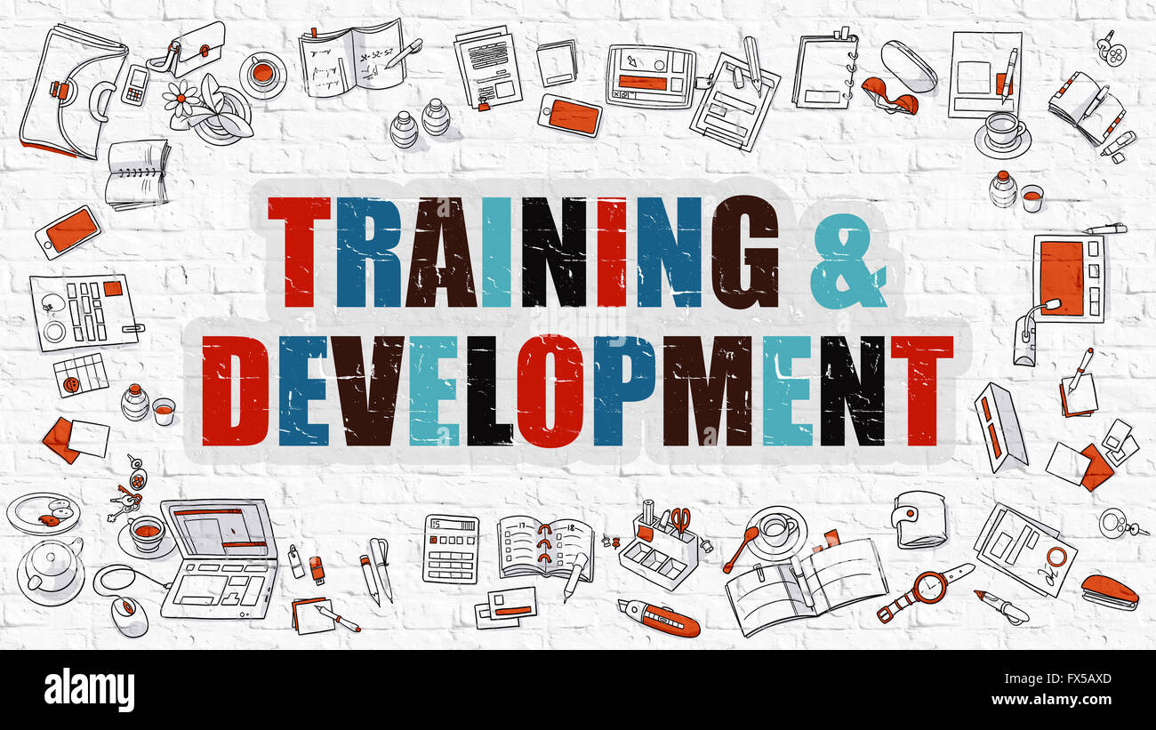 Training and Development on White Brick Wall Stock Photo - Alamy