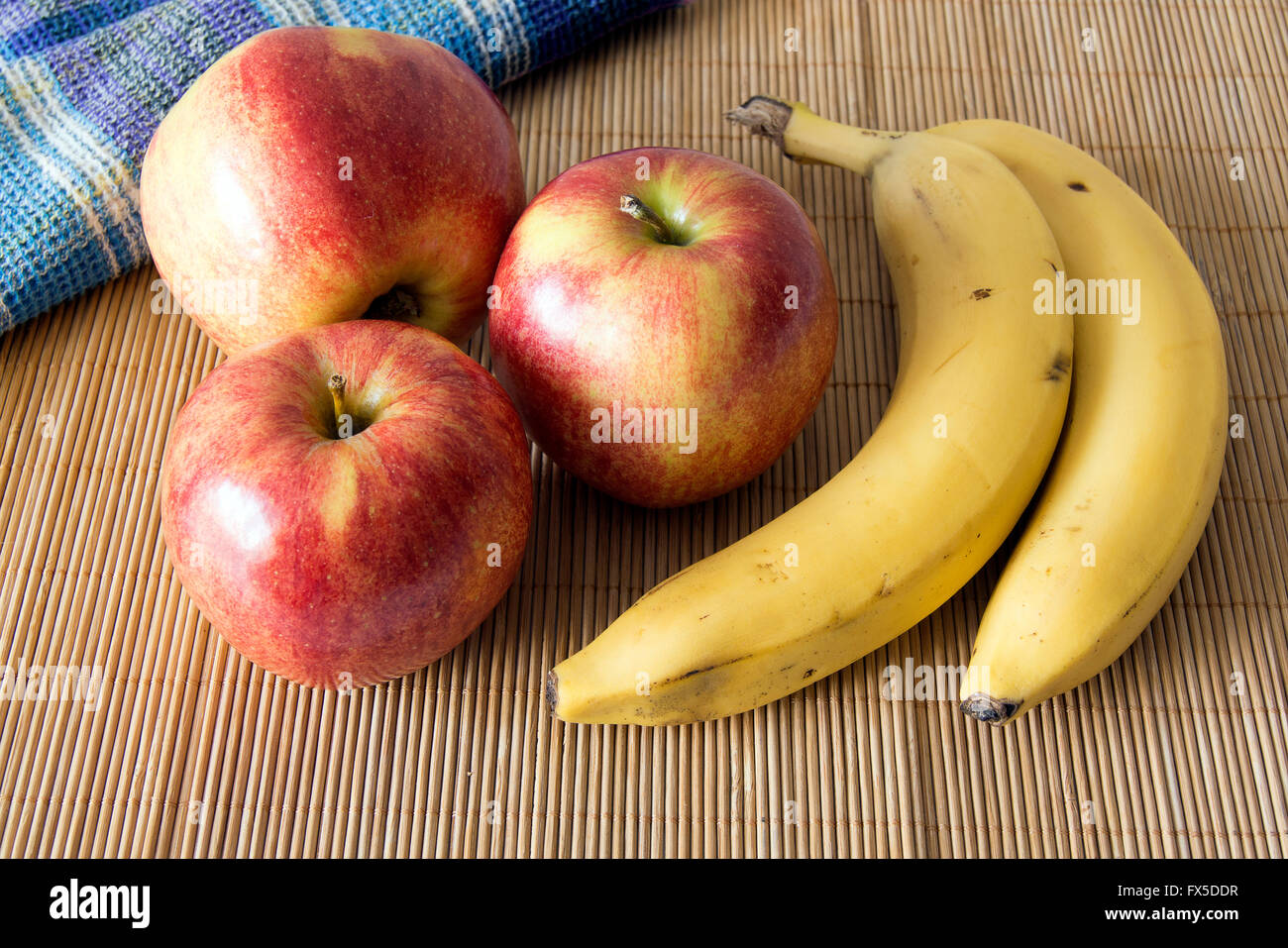 Apples and bananas Stock Photo - Alamy