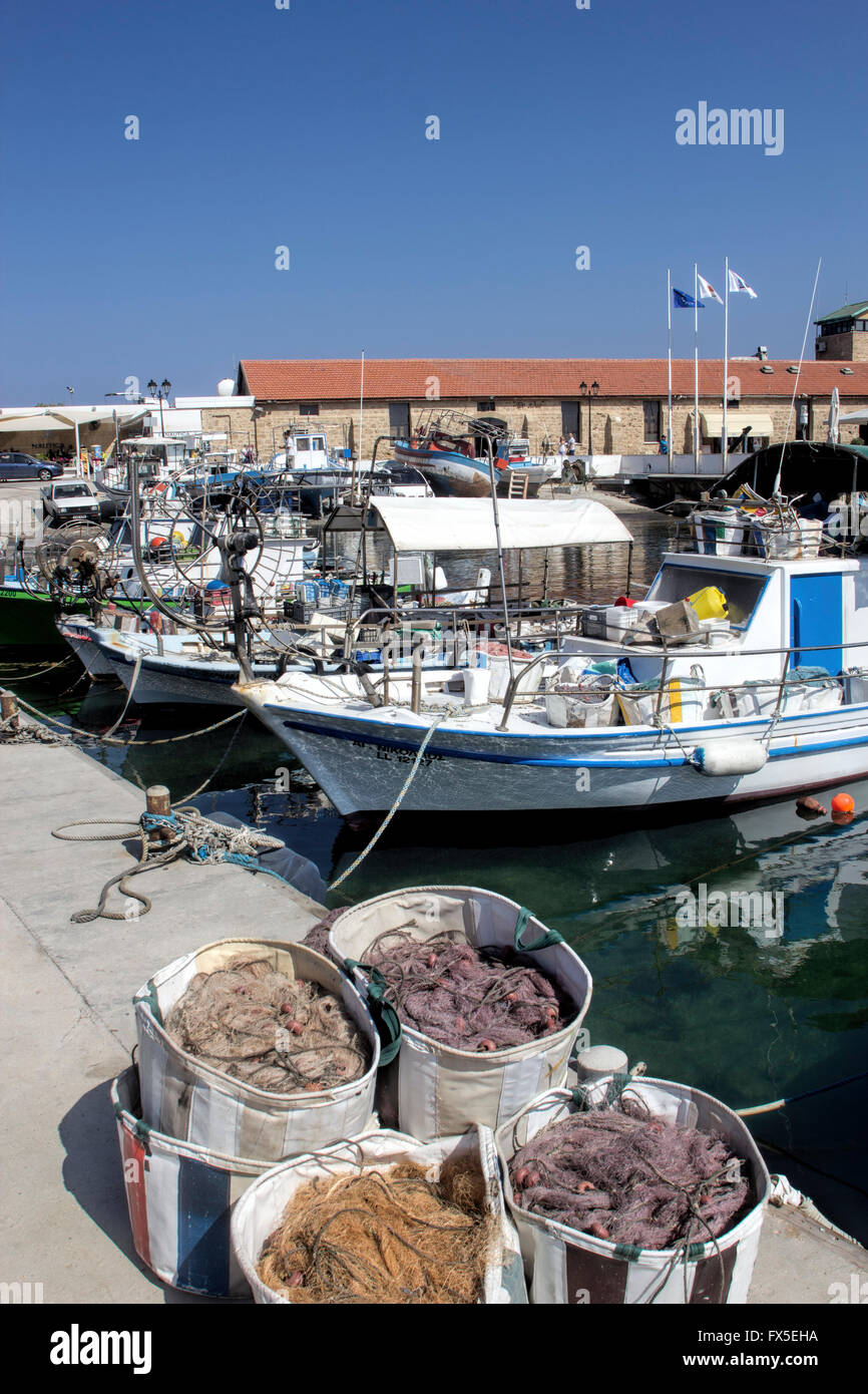 Traditional fishing boats moored up in the Mediterranean port of Paphos ...