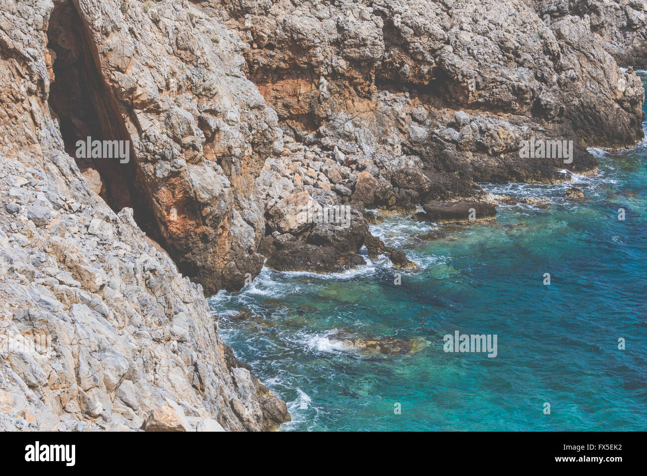 Beautiful Deep blue sea and rocks in Greece Stock Photo - Alamy