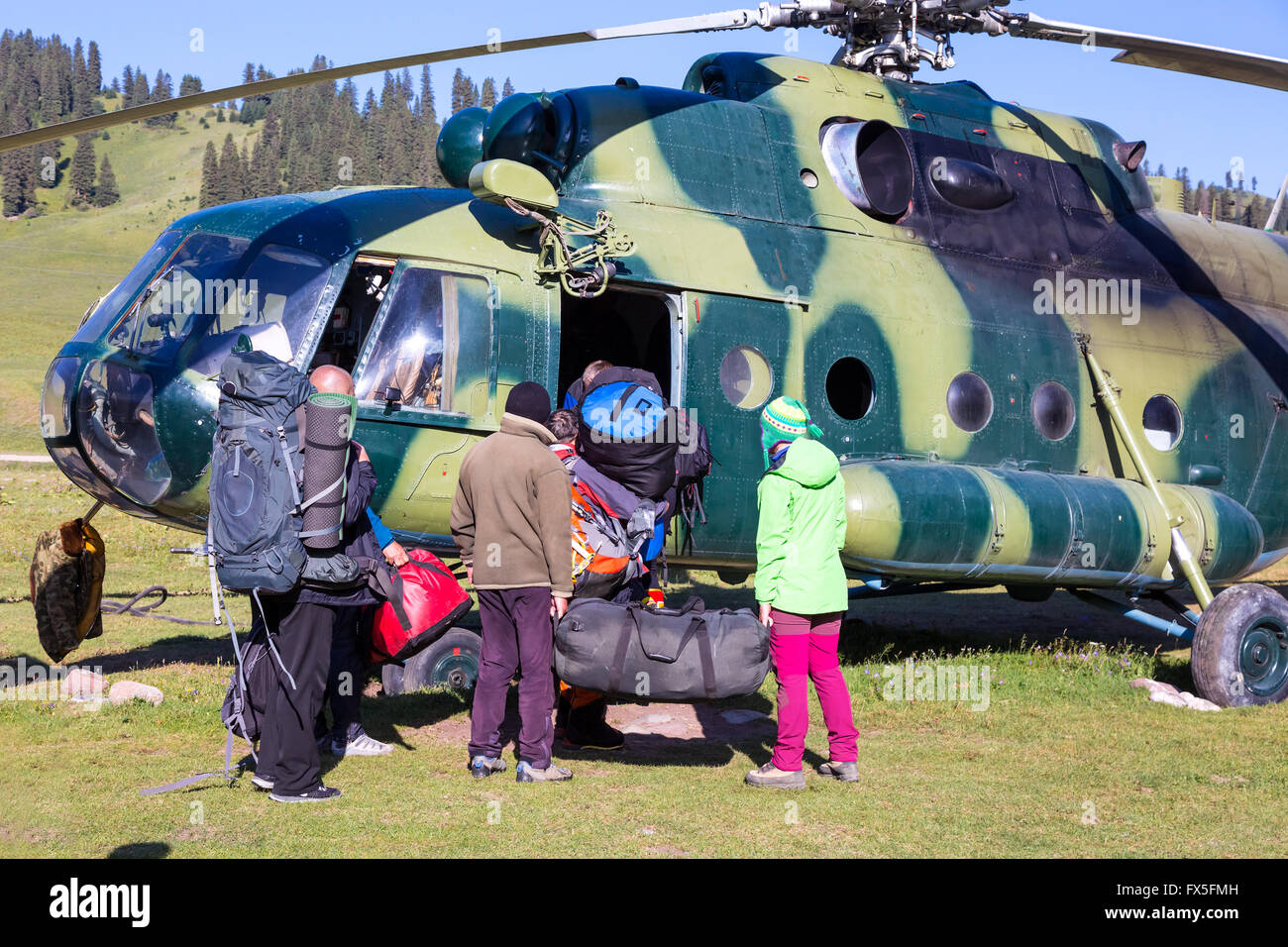 Helicopter Landing Ground and People Preparing for Boarding Stock Photo ...