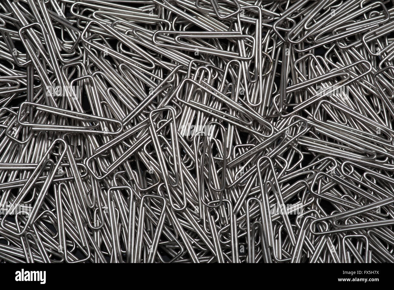 Black paperclip hi-res stock photography and images - Alamy