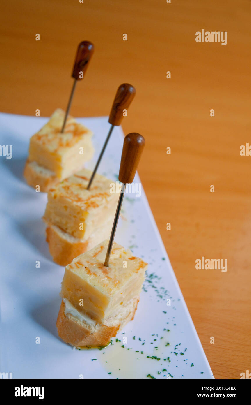 Typical pinchos of Spanish omelet. Spain Stock Photo - Alamy