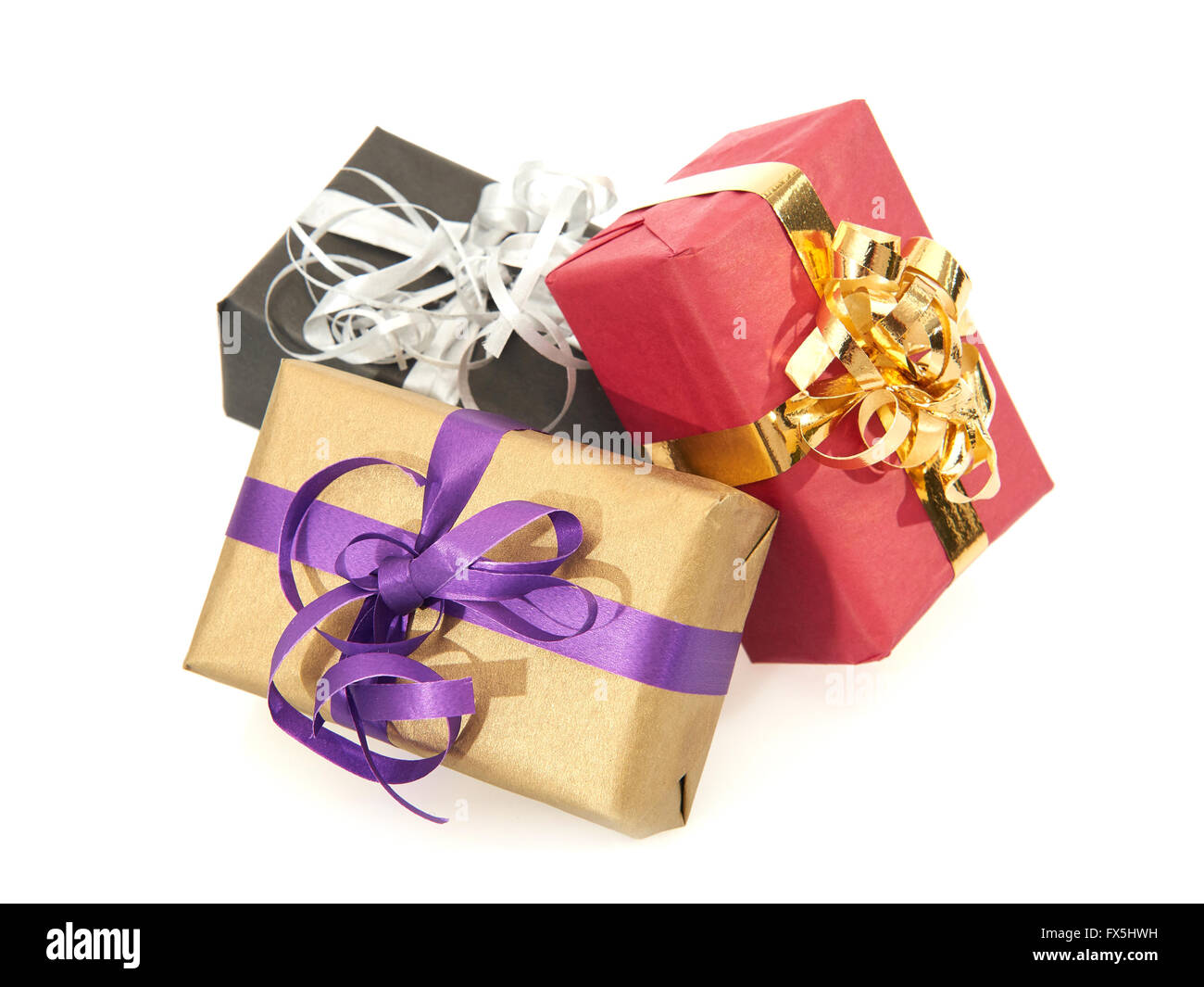 Colourful christmas presents isolated on a white background Stock Photo ...