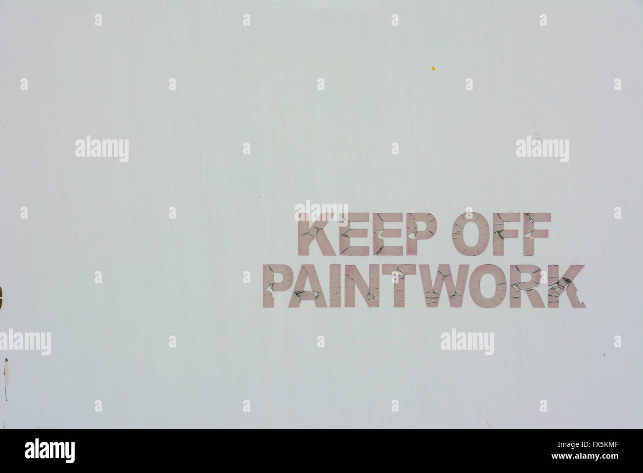 Keep Off Paintwork hand painted sign against a plain white metal ...