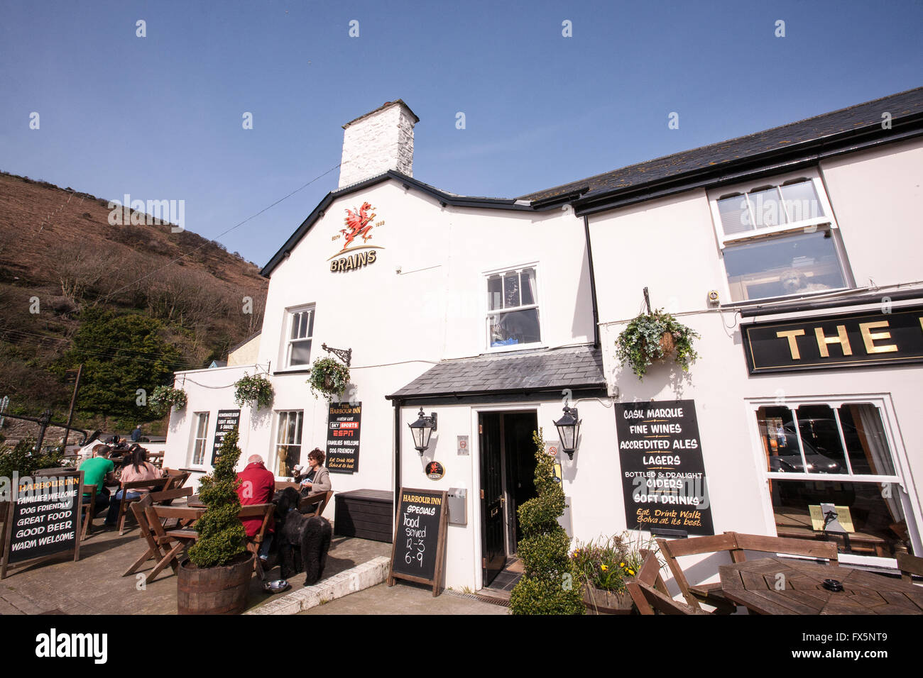 "Harbour Inn" pub on a sunny day in Solva, an attractive village along ...