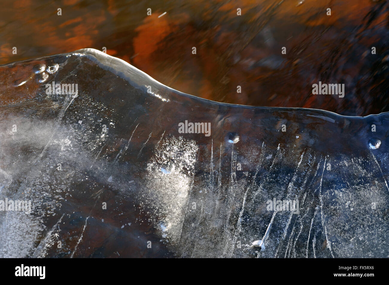 Spring melting of ice and the flow of water Stock Photo - Alamy
